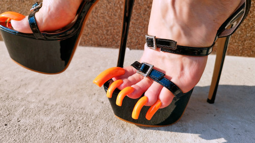 Photosession for video "Black High Heels & Long Orange Toenails" - Lora ...